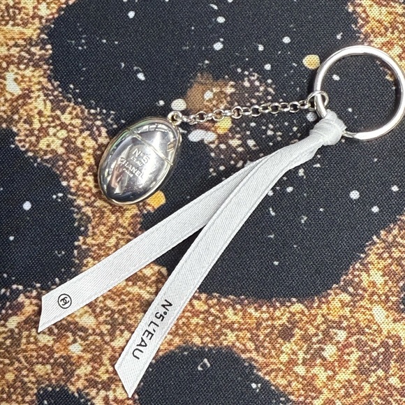 chanel parfums | Accessories | Chanel Parfums Gwp Egg Keychain | Poshmark